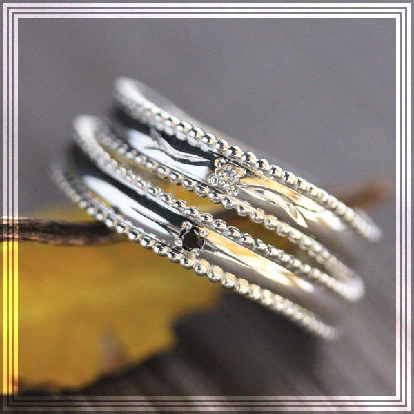 PT900を使用したオリジナルペアリング。2本セット(メンズ1本、レディース1本)の価格になります。素材PT900コメント緩やかなＳ字のリングにミル打ちを施したリング。リングの中央に天然ダイヤモンド1石をセットし、レディースリングはダイヤの...