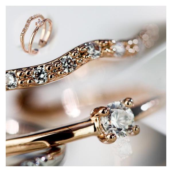 カジュアルからドレッシーな装いまで、どんなシーンにも幅広く使えるツインリング、指先に女性らしい印象をもたらします♪♪二つのリングを重ね着けのようなデザイン、お得な気分で嬉しい！■商品詳細　　状　態：新品材　質：高品質キュービックジルコニア、...