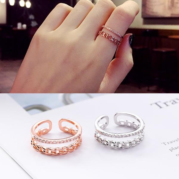 カジュアルからドレッシーな装いまで、どんなシーンにも幅広く使えるツインリング、指先に女性らしい印象をもたらします♪♪２つのリングを重ね着けのようなデザイン、お得な気分で嬉しい！■商品詳細　　状　態：新品材　質：キュービックジルコニア、真鍮(...