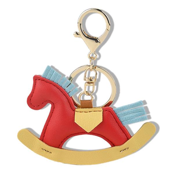 バッグや鍵を簡単に彩る、愛らしいロッキングホースキーホルダー。レザー調素材に上品なステッチ、ゴールド金具が魅力。馬好きへのギフトにも最適な多用途アイテム。　分類タグ:  【その他 雑貨など】  【ブラック】  【ブルー】  【ブラウン】  ...
