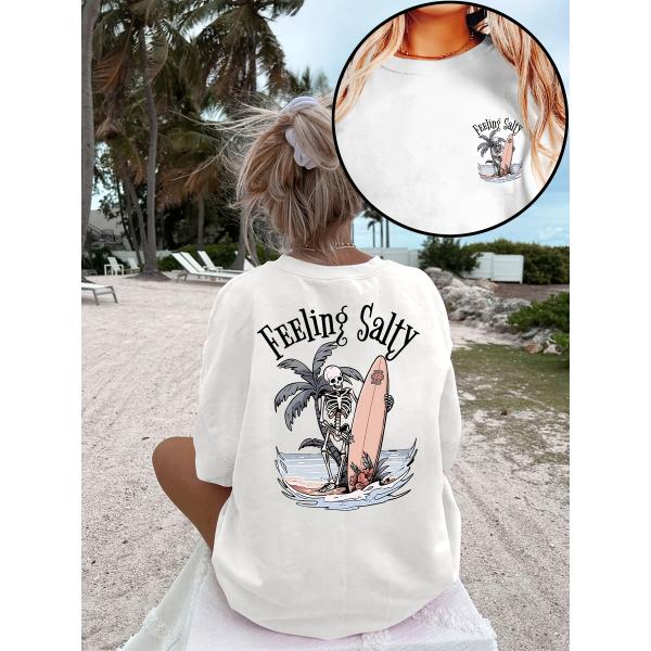 「FEELING SALTY」の遊び心あるサーフスカルデザインサーフボードを持った骸骨（スカル）と「FEELING SALTY」のテキストを組み合わせた、ユーモアあふれるグラフィック。サーファーやビーチ好きの心をくすぐります。ゆったりフィッ...