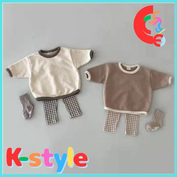 おしゃれで快適なセットアップが、ボーイズとガールズ向けに登場！シンプルなトレーナーとチェック柄ボトムスが、お子様のスタイリッシュな日常を演出します。 デザインと特徴:ベージュ系とブラウン系の組み合わせ: 温かみがあり、どんな季節にも合わせや...