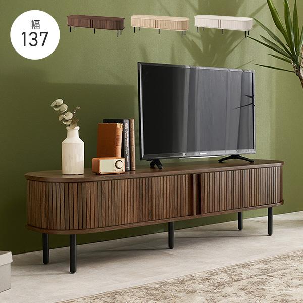 曲線と陰影が美しいタンブールドアのテレビ台。タンブールドアとは、蛇腹のように細板が連なって折り畳める構造で、美しさと実用性を兼ね備え、古家具にも用いられているデザインです。スチール脚がシャープでモダンな印象を与えつつ、木目調がウッディな柔ら...