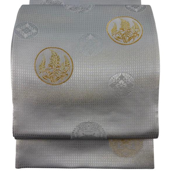 【着物ランク】秀品【素材】正絹【帯丈】約450cm【帯幅】約31cm【帯仕立て】仕立て上がり【コメント】セミフォーマルでお使いいただける袋帯でございます。見る人に重たい印象を感じさせない女性ならではの、気品豊かな一品です。お太鼓柄など所々に...