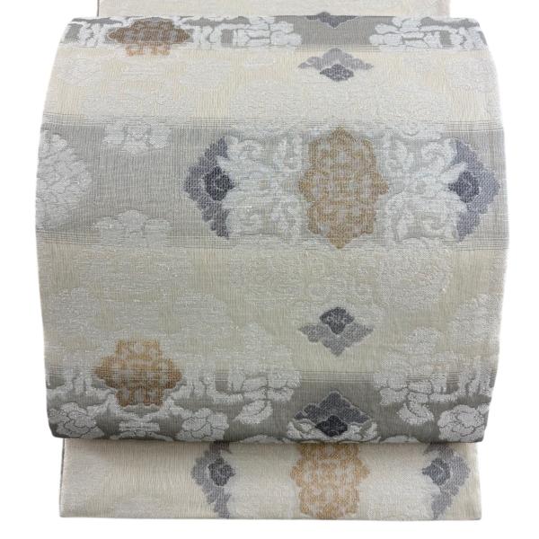 【着物ランク】名品【素材】正絹【帯丈】約446cm【帯幅】約31cm【帯仕立て】仕立て上がり【コメント】普段使いでお使いいただける袋帯でございます。カジュアルな装いに合わせてお使いください。締め跡がございます。リユース品としては目立った染み...