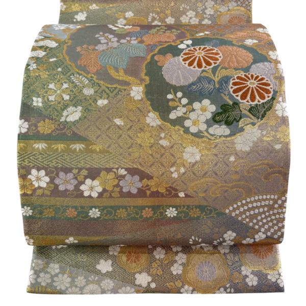 【着物ランク】秀品【素材】正絹【帯丈】約432cm【帯幅】約31cm【帯仕立て】仕立て上がり【コメント】セミフォーマルでお使いいただける袋帯でございます。見る人に重たい印象を感じさせない女性ならではの、気品豊かな一品です。締め跡がございます...