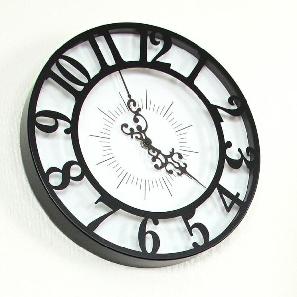 影で楽しむ掛け時計一見、平面に思えるフェイス...よーく見るとガラスとスチールを組み合わせて出来た紙細工のよう繊細なデザインをモノトーンの配色が引き立ててくれるクラシカルな趣の中にも新しさを感じさせてくれる主役級の時計お部屋のアップグレード...