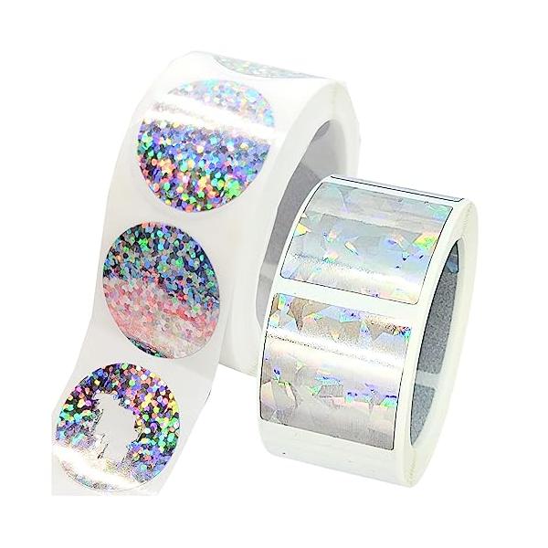 スクラッチシールとは、紙に貼り付けコインや爪などで表面を削ると、下から絵や文字が現れるシールです。ホログラムやドットなどのキラキラとしたかわいいデザインで、ステッカーやラベルとしても使用可能です。丸型・正方形の2種類600枚入りの大容量セッ...