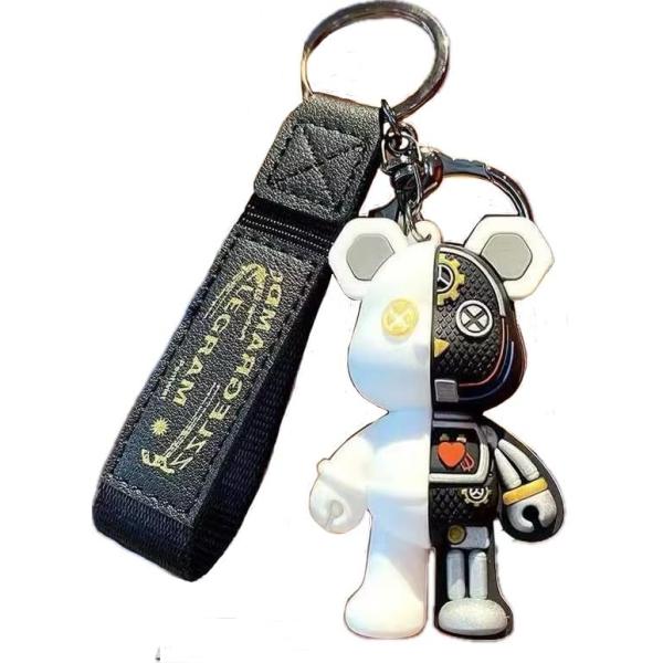 お洒落なクマのキーホルダーです。 恋人やお子さんへのプレゼントにもおすすめです。 重さ　50g クマのサイズ　　縦７*　横4.5*ファッション/レディース/バッグ・財布/バッグ小物/キーホルダー・チェーン