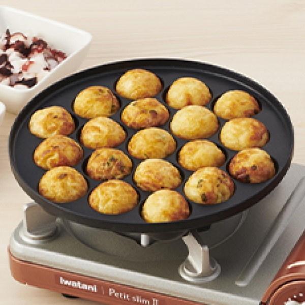 【発売日：2021年09月01日】■商品説明カセットコンロで使う専用「ジュニアたこ焼きプレート」●焼面にフッ素樹脂加工を施し、焦げ付きやこびりつきが少なく、簡単にクルっと返せます。●後片付け、お手入れも簡単！●穴径は約36mmで、1回の調理...