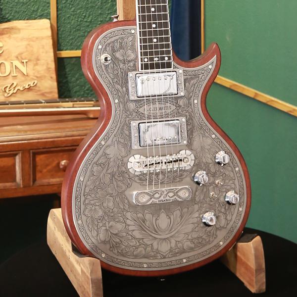 SPEC■Body Top Material: Duralumin■Body Back Material: Select Genuine Mahogany 1 Piece■Neck Material: Select Genuine Maho...