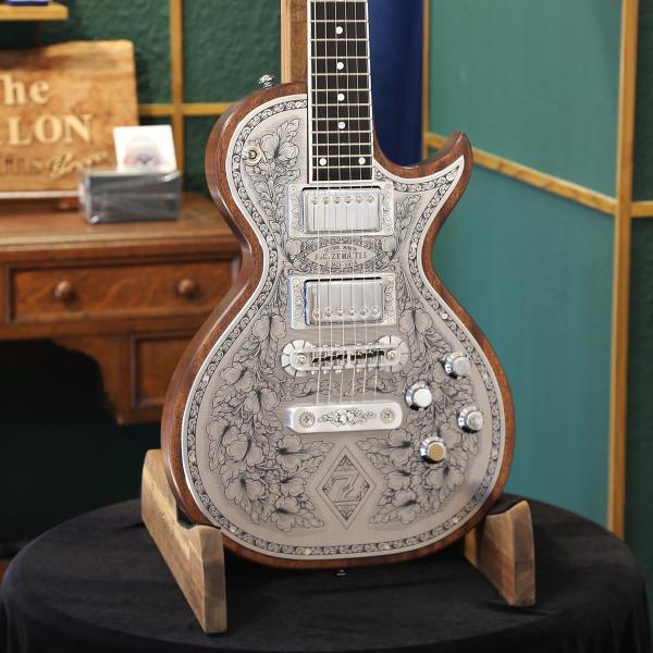 SPEC■Body Top: Duralumin■Body Back: Select African Mahogany■Neck: Select African Mahogany■Neck Joint: Set neck■Nut Width...