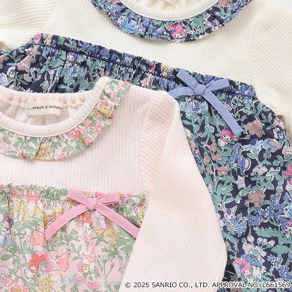 リバティファブリックスの「Melody’s Party（メロディーズ・パーティ）」を使用したセットアップです。マイメロディやクロミ達が草花で楽しんでいる姿を描きました。さりげないリボンデザインもかわいいポイント。バックネックはお着替えしやす...