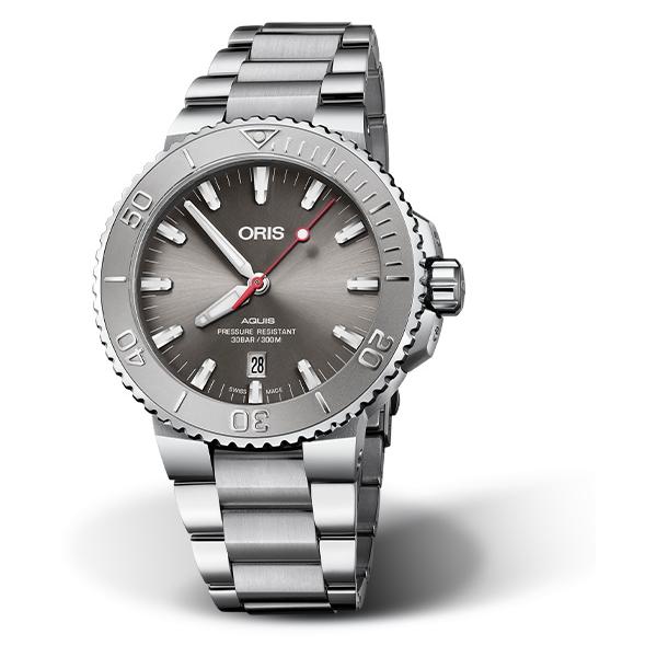 生産国：スイススイス製自動巻きムーヴメント搭載オリス社チューンナップ・ムーヴメントステンレスケースステンレスバンドデイト付きステンレス製逆回転防止ベゼルサファイアクリスタル内面無反射コーティング スーパールミノバ夜光針＆インデックス採用ねじ...