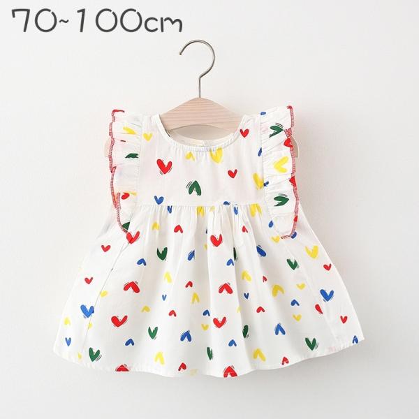 ハートの総柄が可愛い子供用ワンピースです。普段使いからちょっとしたお出かけにも◎【サイズについて】画像をご参照ください。【素材について】90%綿10%ポリエステル