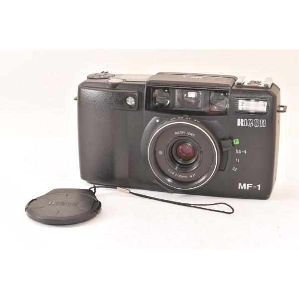 【外観】通常使用によるスレ、キズ少なくキレイです。アタリへこみなどの大きなダメージもありません。フィルム室もキレイな状態を保っています。【光学系】ファインダーにチリやホコリが少し見受けられますが視認性には影響ありません。レンズ表面にカビ、ク...