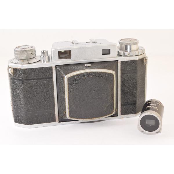 ※現状渡し、ノークレーム、ノーリターンにてお願い致します。5cm 外付けファインダー付き！【外観】通常使用によるスレ、キズと少し革剥がれが見受けられます。アタリへこみなどの大きなダメージはありません。フィルム室は年代物にしてはキレイな状態を...