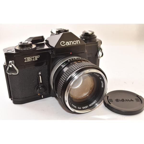 ※現状渡し、ノークレーム、ノーリタンにてお願い致します。FD 50mm F1.4 レンズを装着！【外観】通常使用によるスレ、キズが若干見受けられます。アタリへこみなどの大きなダメージはありません。フィルム室はモルトの劣化が見られますがキレイ...