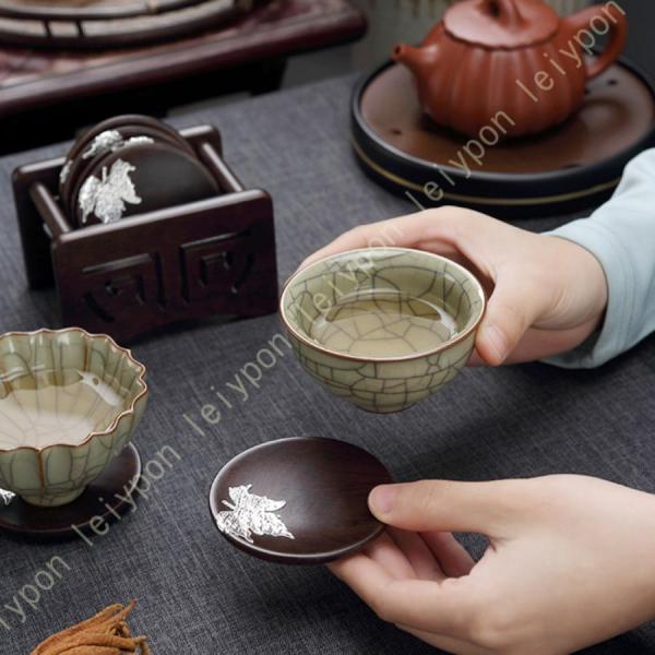 商品の説明 製品：コースター6個、収納ケース1個。具体的な図案は商品画像説明をご覧ください。 ティーカップ、ティーポットなどを置くだけで雰囲気一変お茶の時間をもっと楽しみましょう。断熱性: カップコースター は、良好な断熱特性を持っています...