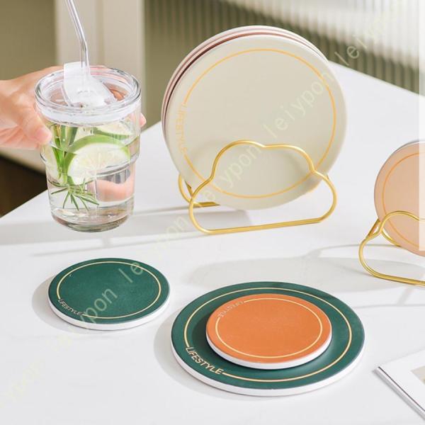 商品の説明 材質：セラミック、コルク。 製品：コースター=直径10cm。収納ボックス=11*5.2*6.3cm。A=コースター4個+収納ボックス1個。具体的な図案は商品画像説明をご覧ください。   1.セラミックで作られたコースターのトップ...