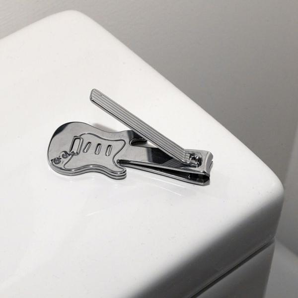 ●カラー：シルバー●サイズ：W3.4×D1.5×H8cm●原産国：中国●入数：1個ステンレス製のギターデザインの爪切り。ストラトタイプのデザインは、ギター愛好家はいつでも爪をキレイにしたくなる。音楽好きな方へのギフトとしてもおすすめ。◆開発...