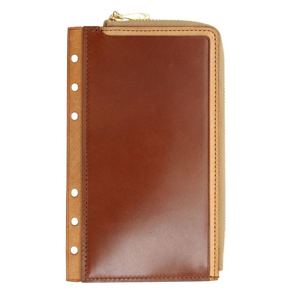 純粋なアニリン水性染料仕上げを施すレーデルオガワ製のコードバンを採用したジッパーポーチリフィルです。小銭やカードの保管に活躍します。染料染めの色味の深さと独特な光沢があり少しづつ色艶を増す経年変色が楽しめます。大人の嗜みをイメージしたオドル...