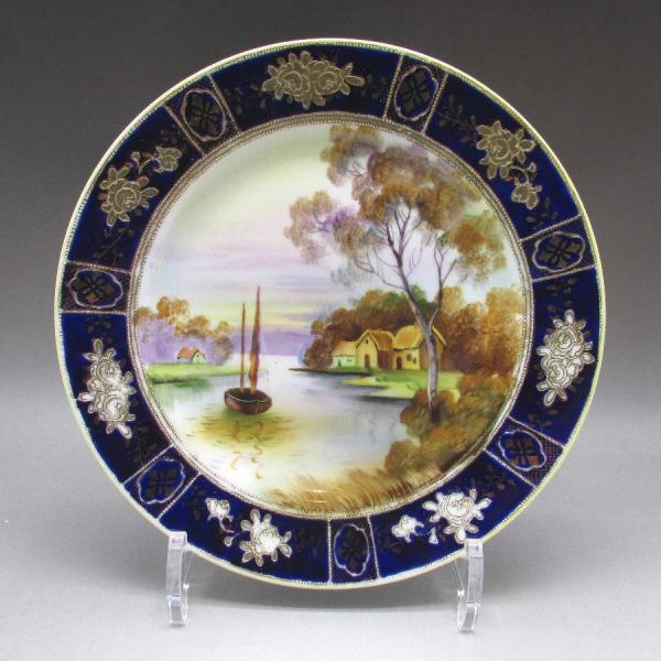 オールドノリタケのコバルト金盛り風景文飾皿です。1918年頃〜1925年頃に欧米に輸出されたものが、約100年の時を経て日本に里帰りしてきました。これらは「里帰り陶磁器」又は「里帰り品」として、現在では再現不可能と言われている高い技術や装飾...
