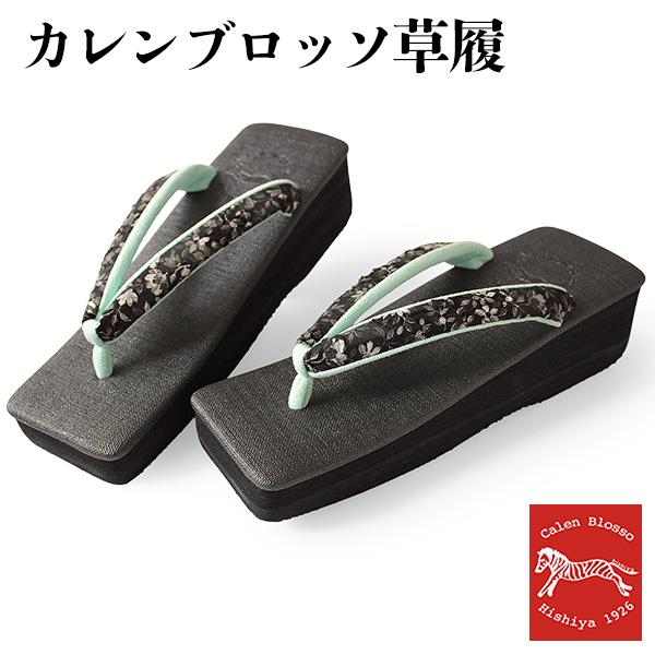 ブランド『Calen Blosso』の高級草履【色柄】台 ：帆布風のダークグレー(天)、ブラック(巻)鼻緒上：濃グレー地に端切れを重ねたオフホワイトの花柄鼻緒下：ミントグリーン【サイズ】スクエア型Mサイズ→台全長 ： 約24cm、台の幅 ：...