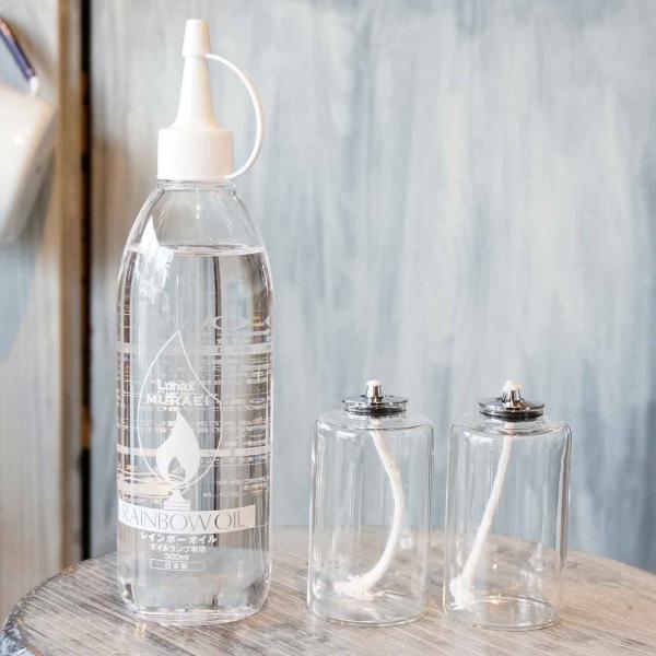 オイルランプ専用ガラス容器です。オイルランプ用の芯、オイルがセットになっています。ボタニカル素材を入れて今話題のハーバリウムランプをお作りいただけます。※【オイル1本、容器2個】×12セット の販売です。■サイズ　高さ約8.7cm x 幅約...