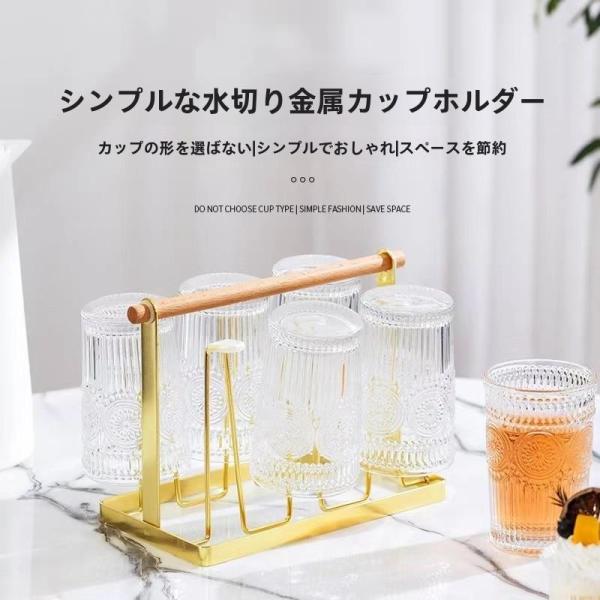 素材 本体:アイアン、バー:天然木、ストッパー:シリコン樹脂、先端部品:シリコン樹脂【北欧風のグラススタンド】ナチュラルな北欧風の木材を用いた安定性のあるグラススタンドです。底部は長方形の形でしっかりと作られているので、コップを置いても転ぶ...