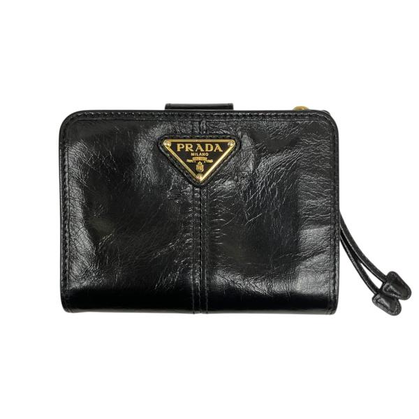 プラダ PRADA25SS 二つ折り財布 25005 1ML018【ランク】「中古品・比較的綺麗な商品」【詳細説明】プラダの25SS 二つ折り財布 25005 1ML018です。【M/L/U】ユニセックス【詳細サイズ】縦幅：約9．0ｃｍ横幅...