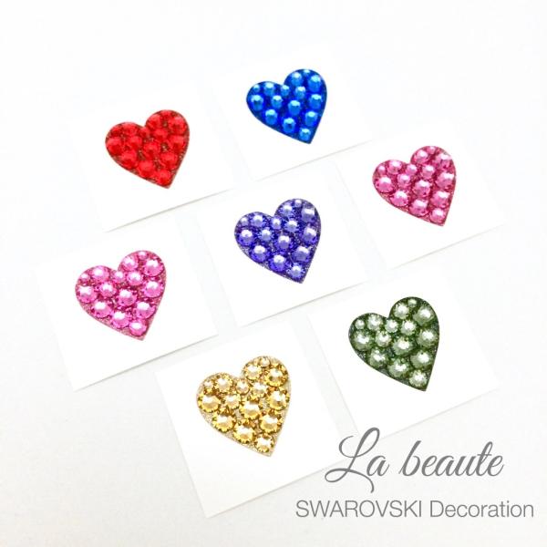 スワロフスキーを使用したキラキラデコシールです。シールになっているから、貼るだけ簡単！スマホに、アイコス(白)に、お気に入りのグッズにデコレーション♪人気のハートデザイン♪他のモチーフやイニシャルシリーズとも組み合わせて使える優れもの！ライ...