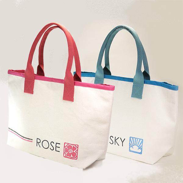 MINI ROSEとMINI SKYをモチーフにしたトートBagです。　大きさ：横幅41cm×高さ24cm　底マチ幅12cm綿100%の白い生地に文字、ロゴのスタンプを押しています。白い生地はざっくりとした感じで、帆布の11号程度の厚みがあ...