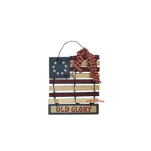 フラッグモチーグのウッドサインです。ミニサイズでどこにでもちょこんと飾れます♪サイズ（約）：幅7cmｘ高8cm（壁掛ワイヤー含まない）ペイントムラや擦れなどのあるカントリー雑貨です。ご覧の環境で多少色が異なります。写真のＭサイズ玉子や果物(...