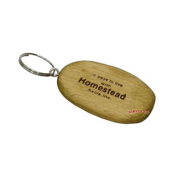 木製のキーホルダーです。サイズ（約）：5cmｘ3cm商品毎に多少サイズや形状が異なります。ご覧の環境で多少色が異なります。写真のＭサイズ玉子やコインは大きさ確認用で付属していません。
