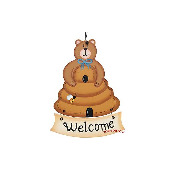 ハチミツ＆クマさんの木製壁掛です。ウェルカムプレート付きで玄関ディスプレイにお勧めです。サイズ（約）：幅16cmｘ高21cm（ワイヤー含まない）／USA輸入品木・鉄ワイヤー／中国製ペイントムラや擦れ、色トビなどのあるアメリカンカントリー雑貨...