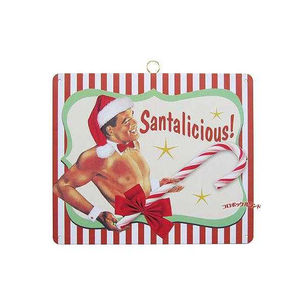 縦ストライプキャンディカラーのクリスマスサインです。（新品）レトロデザインで６柄を販売しています。サイズ（約）：幅21cmｘ高18cm（リング含まない）／USA輸入品ペイントムラや擦れなどのあるUSAカントリー雑貨です。商品毎に多少サイズや...