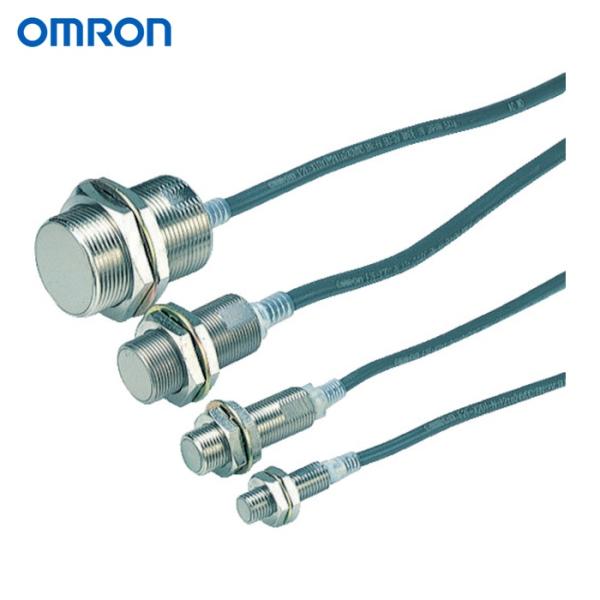OMRON 近接センサー|特長:長距離検出で安定稼働を実現し突発の保全対応を削減します。 装置の振動でドグが離れても検出ミスが起きにくいです。 ワークの着座位置のばらつきがあっても衝突が起きにくいです。