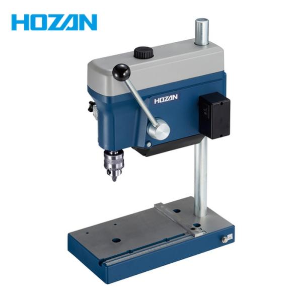 HOZAN 卓上ボール盤|特長:ベルトの掛け換えで3段階に変速できます。 (2100/4500/6200rpm)・平行穴あけ加工に便利な平行ガイド付です。 切削深さ調整ストッパー(最大30mm)、平行穴開け加工用平行ガイド、アース端子付です。