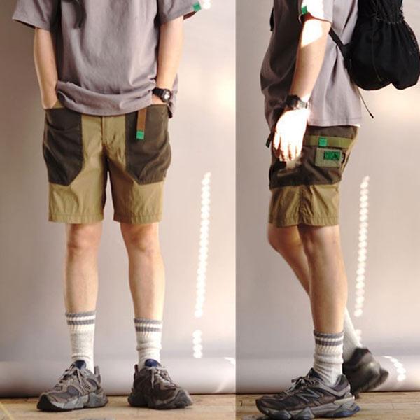 H.A.K.U MOUNTAIN SUPPLYハンズフリーショーツ　Version2.0。【シルエット】ウエストにゆとりを持たせ、股上は少し深め。ヒップ下にたぶりが生まれるユニークなバランスで、リラックス感のある穿き心地。裾は膝上丈でややコ...