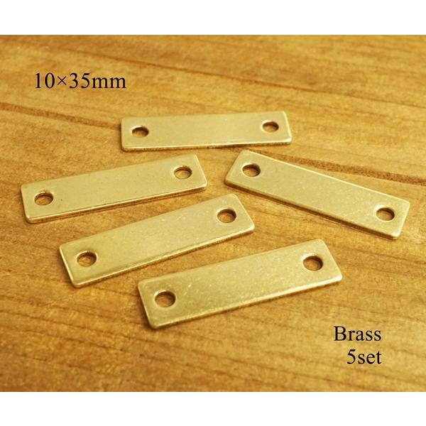 ○材質 真鍮○カラー 真鍮色(生地色)○サイズ (厚み×縦×横)1.2mm×10mm×35mm, 穴径3.2mm〇個数　5枚長方形型の真鍮ネームプレートです。当ストアオリジナルアイテムです。(日本製)刻印を入れることも可能であり、オリジナル...