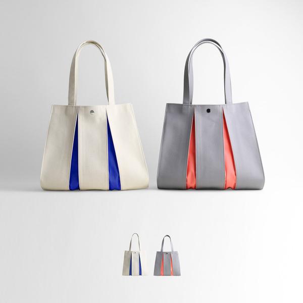 人気のサイズのトートバッグに装飾がプラスされました。中央に留め具のスナップボタンが配され、さり気ないアクセントに… 　A4サイズが入り長めの持ち手で肩に掛けることができシンプルなデザインでユニセックスにお使いいただけます。京都で培われた伝統...