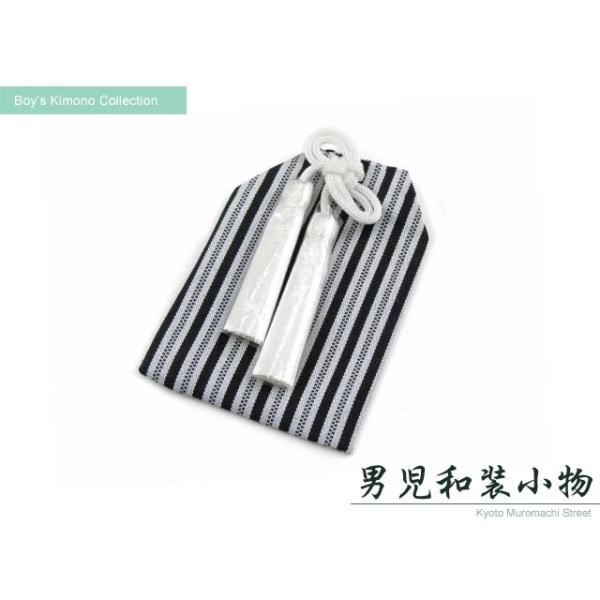 縞柄のお祝い着物用のお守り（懐）です。別売りの懐剣と合わせていかがですか？・長さ：　約９．５cm・幅　：　約　　６cm・素材：　ポリエステル　１00％・中國製※モニターの色の加減により写真の色と実際の商品の色が異なって見えることがあります。