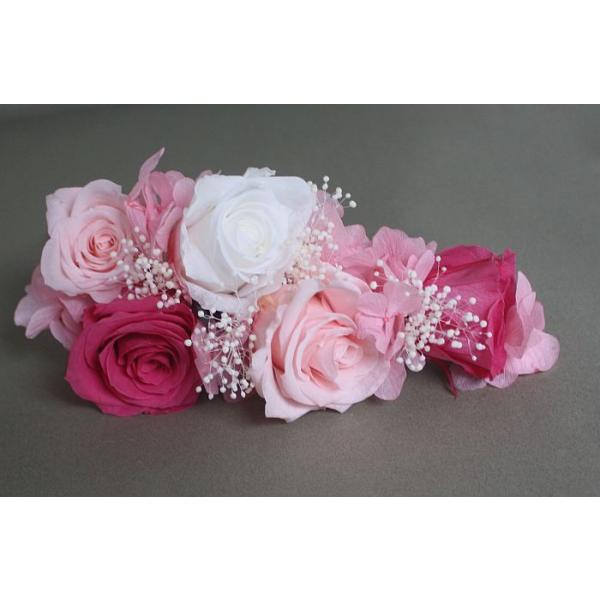 プリザーブドフラワー使用のヘッドドレスバラ・アジサイ・カスミソウはプリザーブド使用です根元にリボンをお付けしてあります裏側にはコームをお付けしてあります