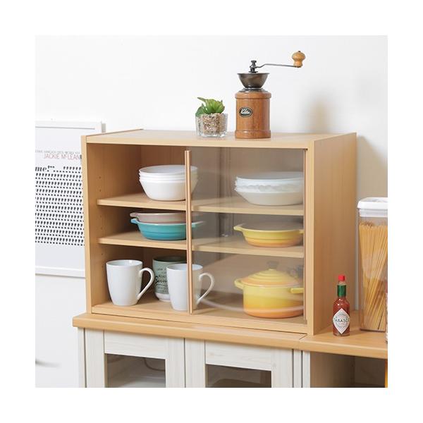 ★商品紹介★1.2人暮らしにぴったりな、ミニ食器棚になります。ナチュラルなお色で、どんなお部屋にも合いますよ♪★商品詳細★サイズ：W600×D290×H440mm重量：9kg規格材質：ガラス、プリント紙化粧繊維板生産国：マレーシア〇お客様組...