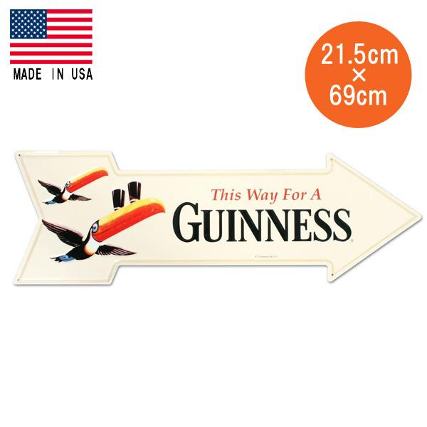 "This Way For A GUINNESS"「ギネスビール」を案内してくれる矢印型のメタルサインです！ギネスビールをクチバシの上に載せて運ぶマスコット「トゥーカン（オオハシ）」がデザインされ、全体の矢印の輪郭とマスコット、テキストはエ...