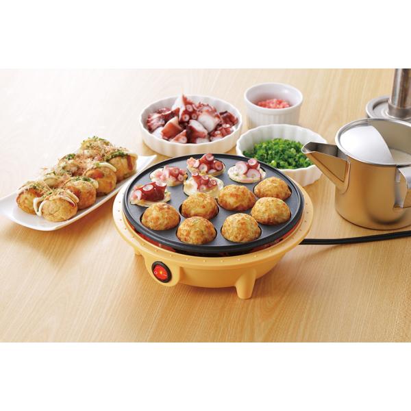 プエル たこ焼きプレート12穴(PU-105)たこ焼きが返しやすいたこ焼きプレートアツアツ出来たてのたこ焼きがご家庭で楽しめます。プレートはフッ素樹脂加工なのでたこ焼きが返しやすい。サイズ／約φ200×70mm　　　　(プレート：径200m...