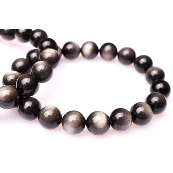 【材質】シルバーオブシディアン 7.5mm【腕周り】約14.5cm(伸縮性有り)【重さ】13g  黒地に銀色の煌めきが浮かび上がります。かっこいい物をお探しの方におすすめです。オブシディアンは、心引き込まれるような、神秘的な光を秘めた石です...