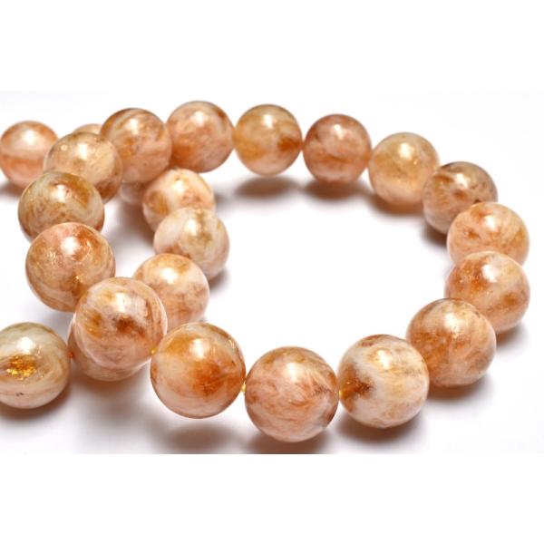 【材質】フェザーインシトリン 12.5-13mm 産地：ブラジル【サイズ】約12.5-13mm(±0.5mm)【腕周り】約16.5cm(伸縮性あり)【重さ】約50g【特徴・意味】天然色のシトリンにホワイトカラーのアゲートが共生したレアアイテ...