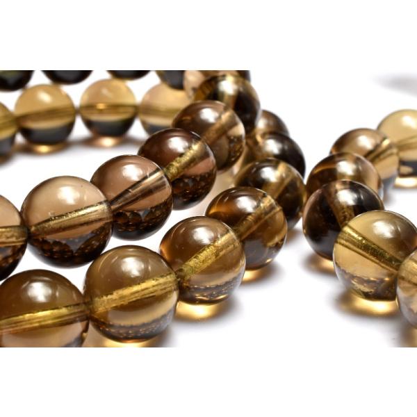 【材質】ゼウスクォーツ(スモーキーシトリンファントム) 9mm 産地：ブラジル【サイズ】約9mm(±0.5mm)【腕周り】約18cm(伸縮性あり)【重さ】約25g【特徴・意味】魔晶ゼウスなどの名前で人気の希少石です。ゼウスクォーツとはアメト...